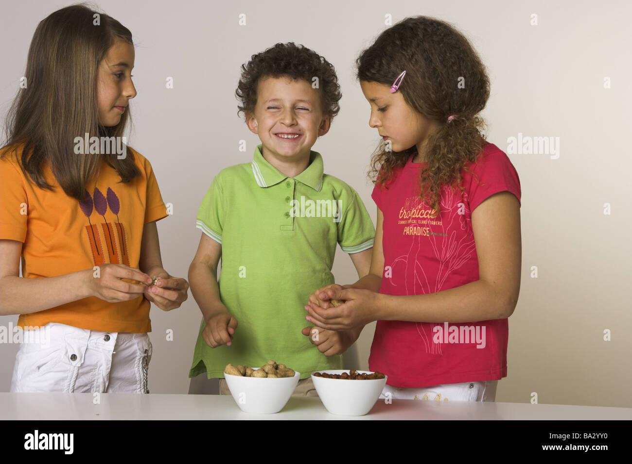 Give birth girls laughs peels nuts differently eats series people ...