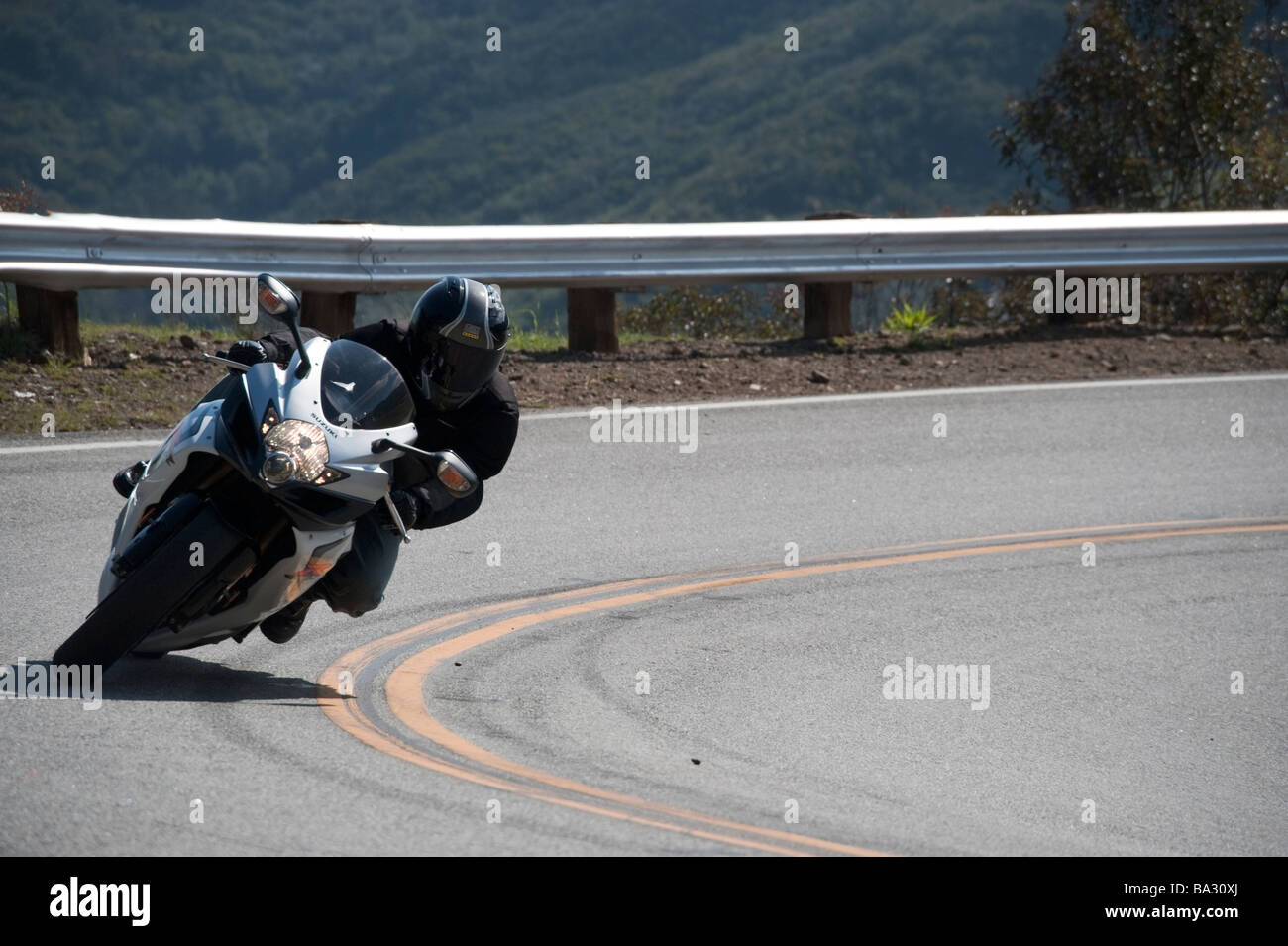Motorcycle and Rider on Mulholland Highway in Southern California Stock ...
