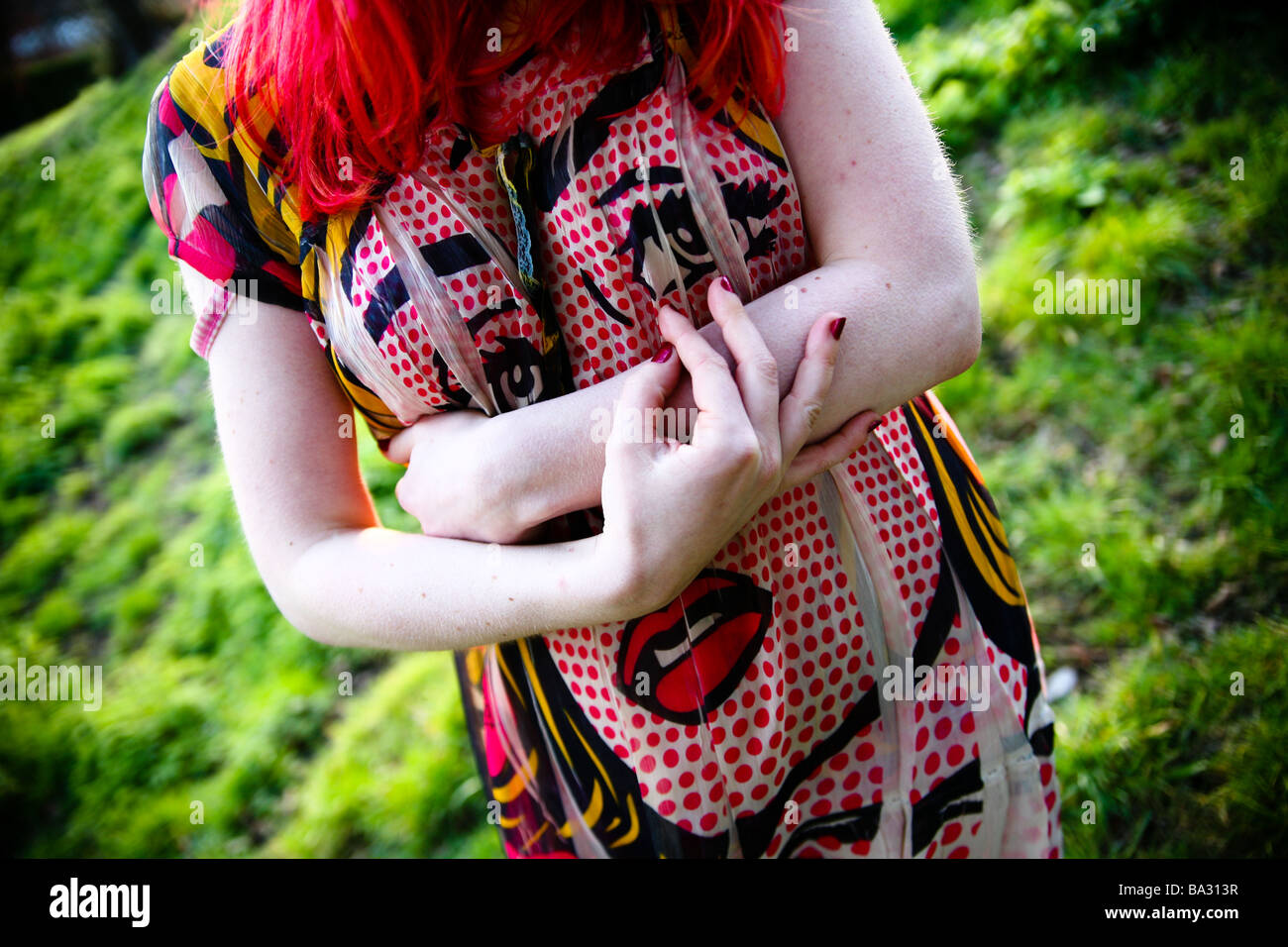 Faceless girl in dress with red hair outside Stock Photo - Alamy