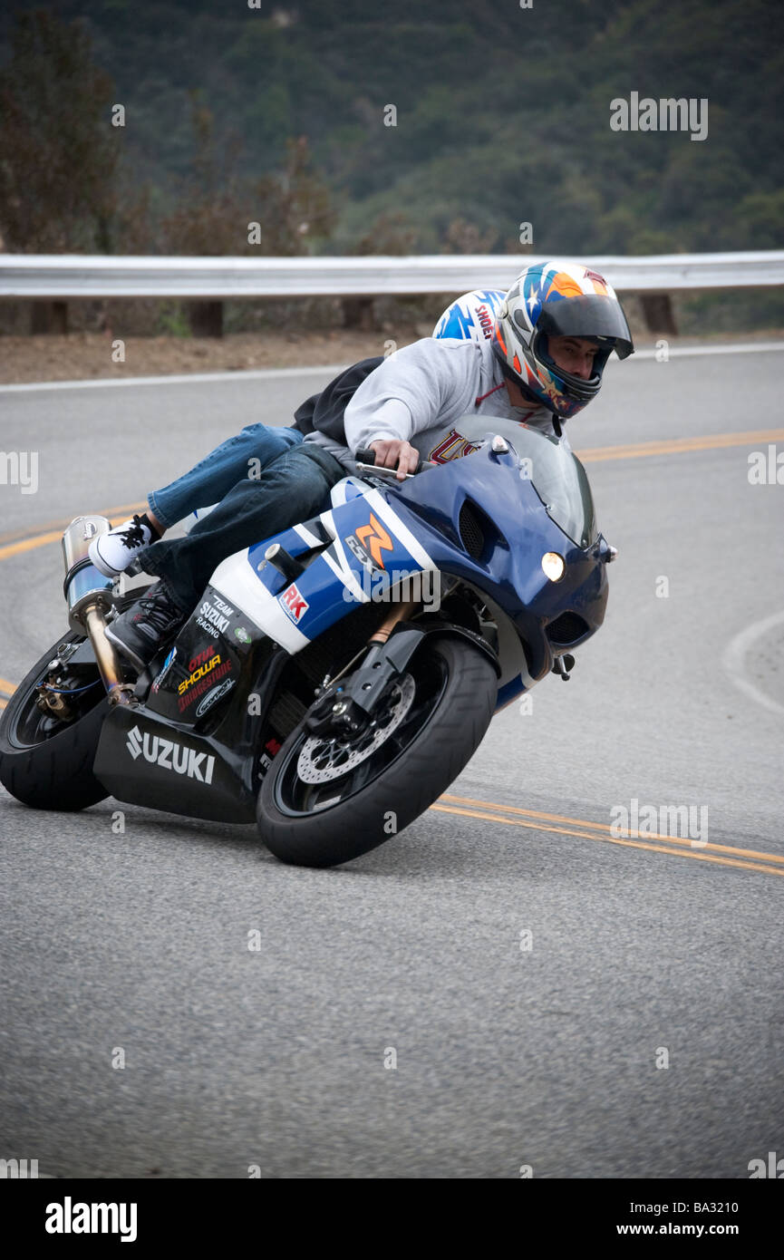 Motorcycle and Rider with a Passenger on Mulholland Highway in Southern ...