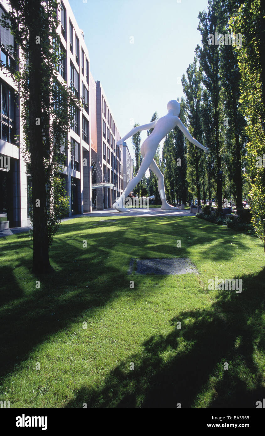 Walking man sculpture munich germany hi-res stock photography and ...