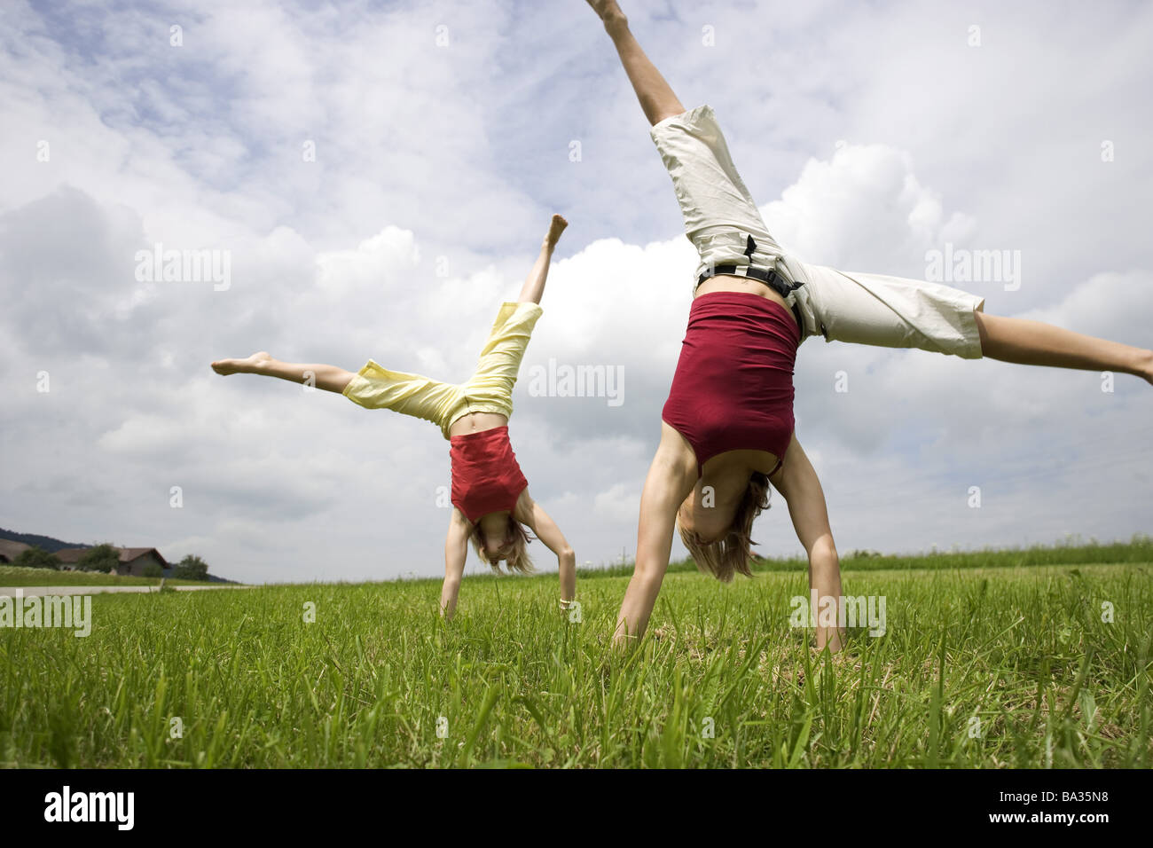 Girl doing a cartwheel hi-res stock photography and images - Alamy