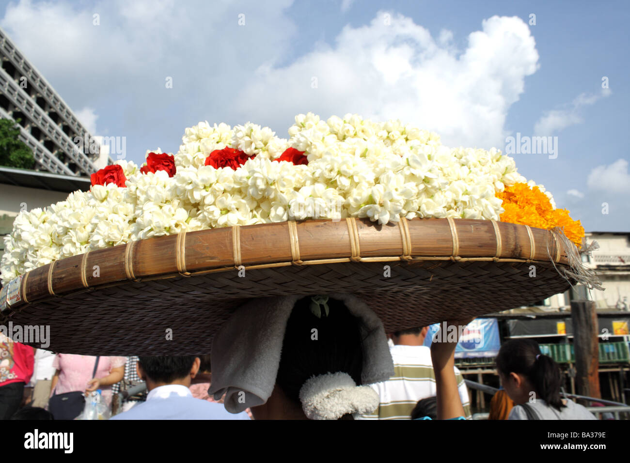 Thai merchant with garland flowers Stock Photo - Alamy