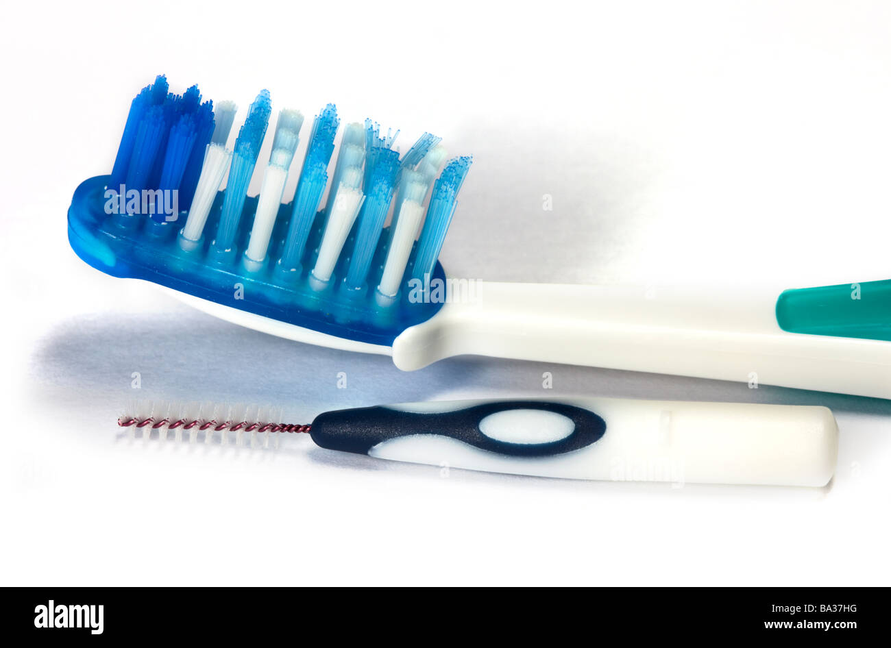 Toothbrush and Interdental Brush Stock Photo - Alamy