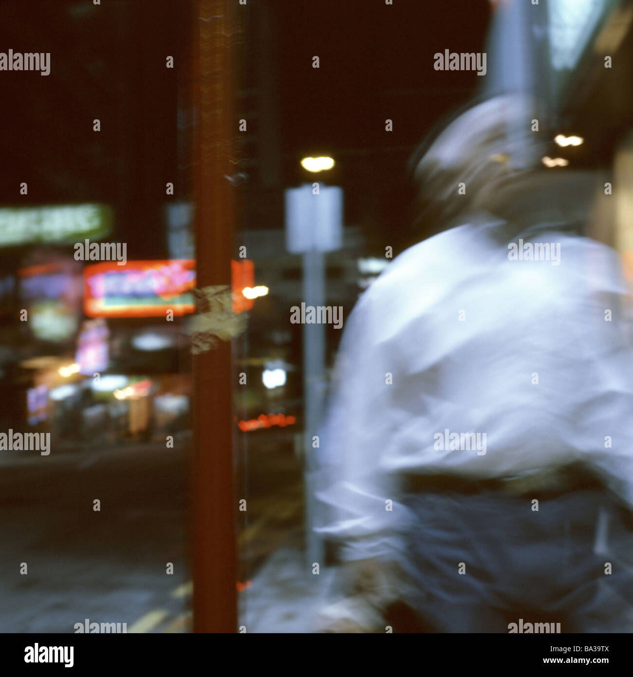 Street-scene passer-by neon sign fuzziness city urban urbanity ...