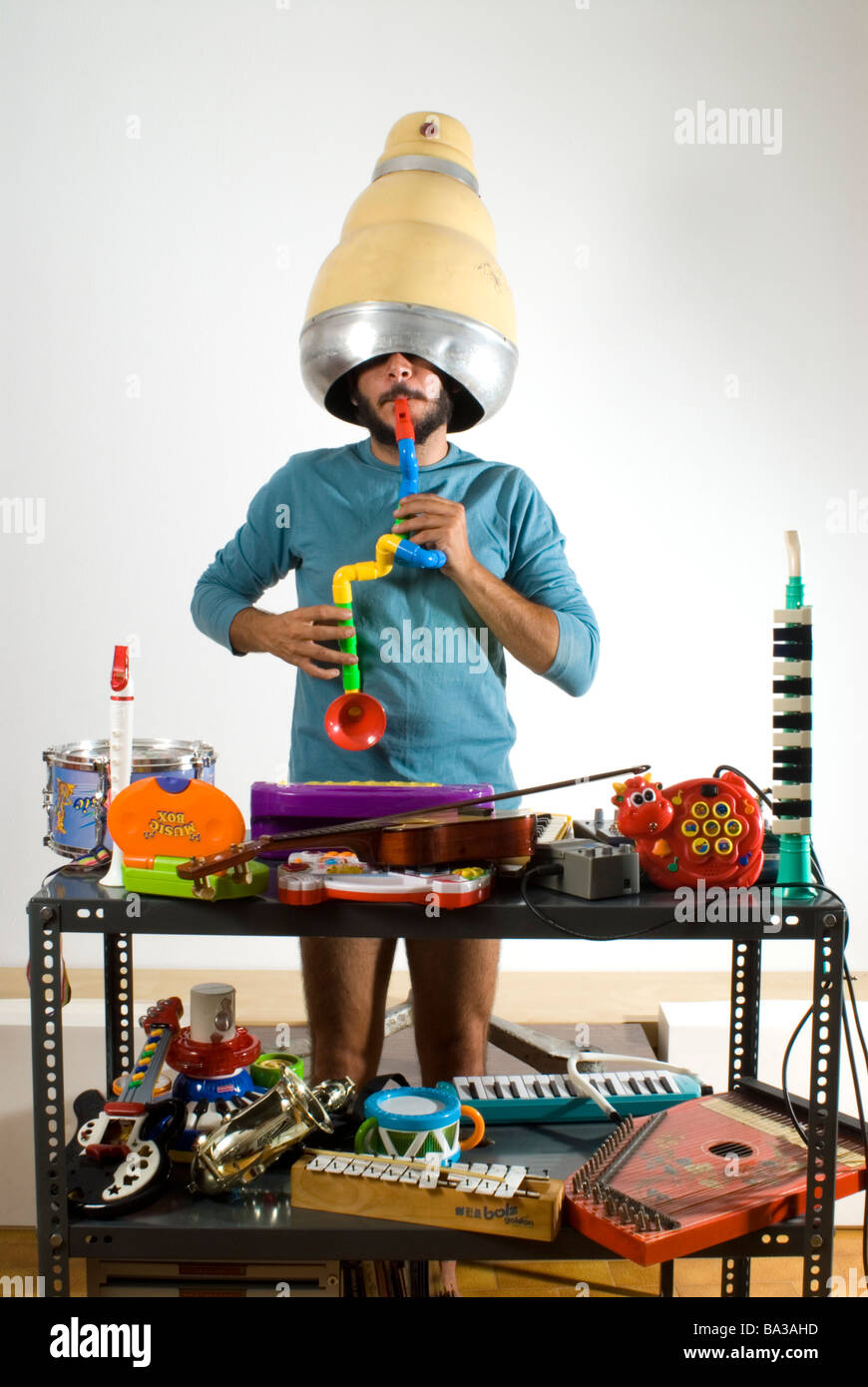 Greek experimental musician Taso Stamou who uses kids toys and ...