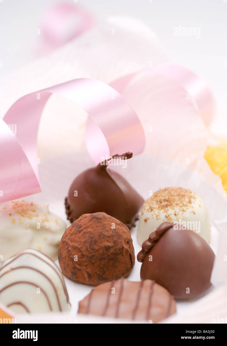 Assorted chocolate truffles close up Stock Photo - Alamy