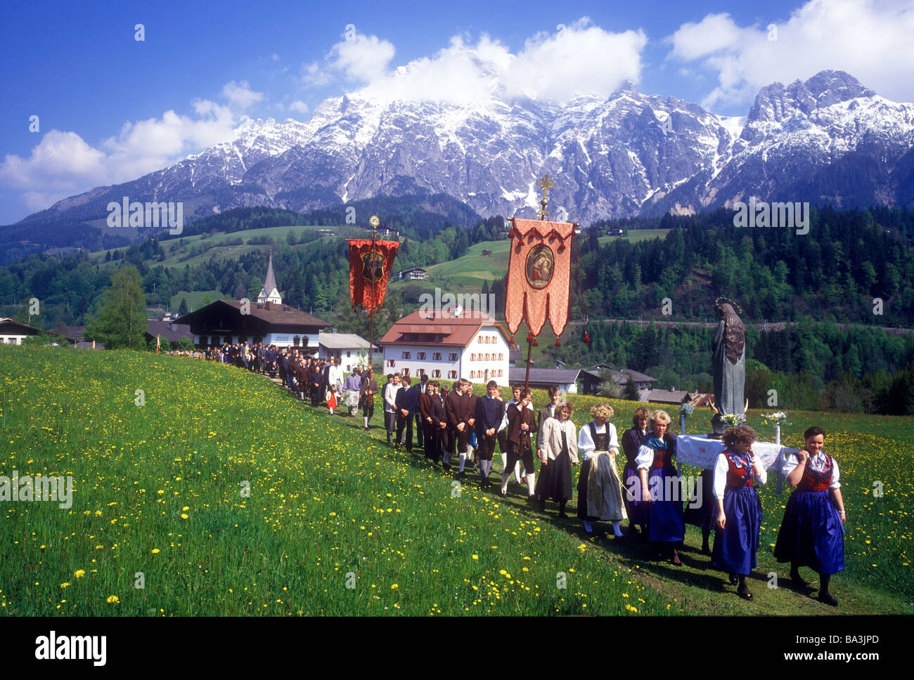 Corpus Christi procession taking place in beautiful alpine setting at ...
