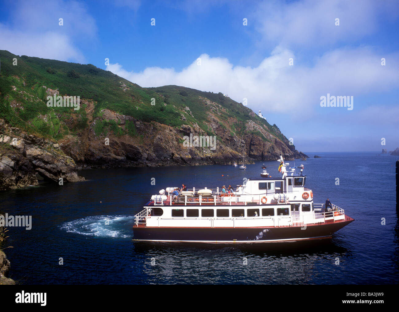 Ferry for Guernsey leaving the jetty of La Maseline harbour on the ...