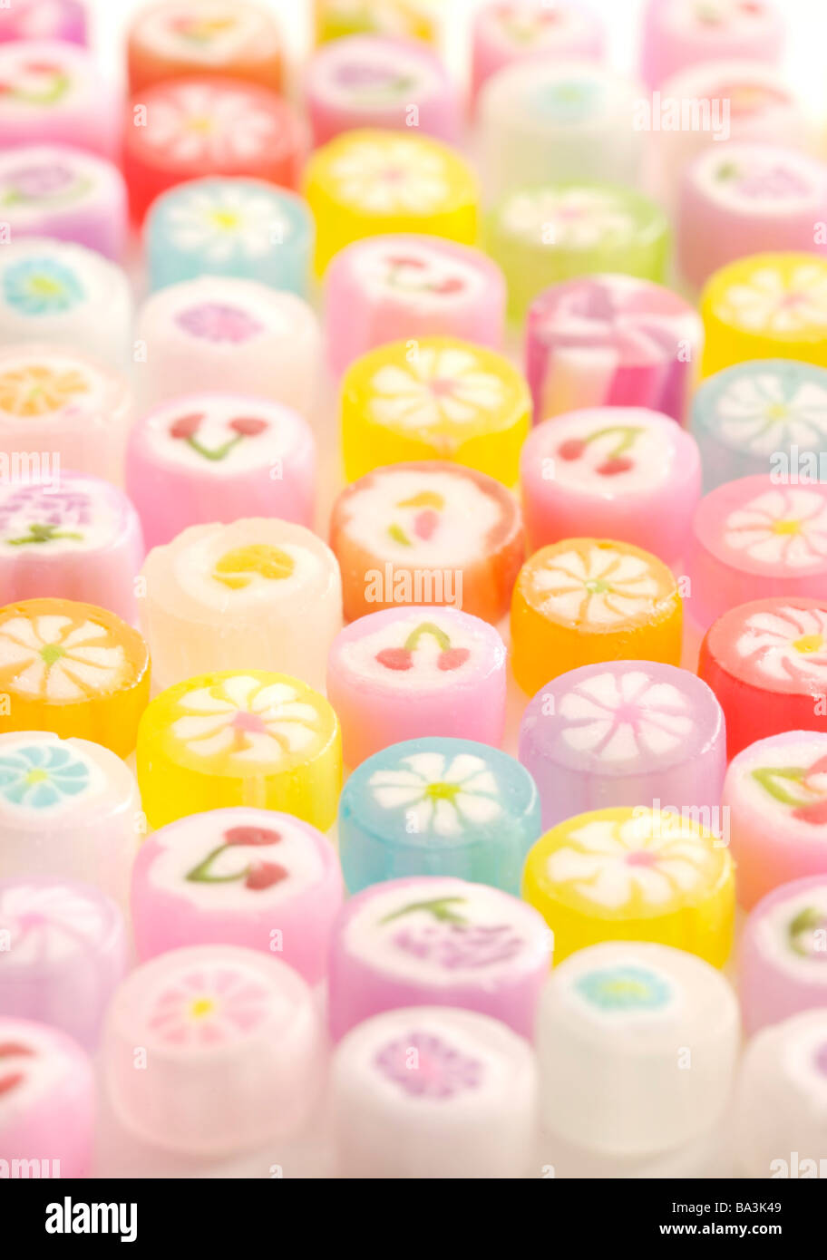 Colorful hard candies in rows full frame Stock Photo - Alamy