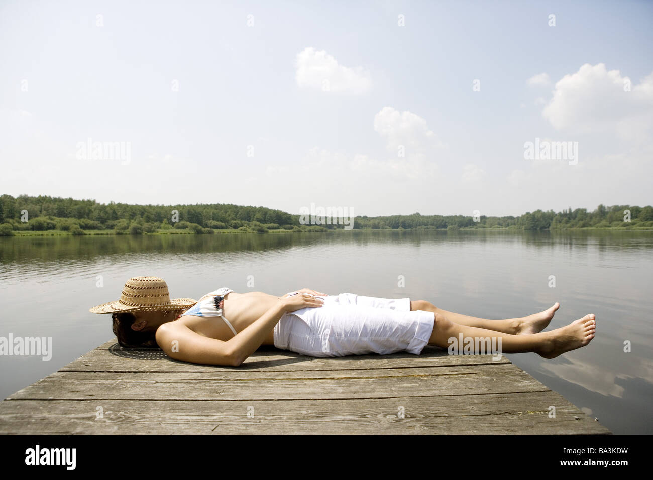 Woman young bikini bridge sea hi-res stock photography and images - Alamy