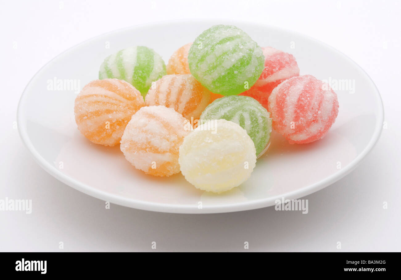 Coloured hard candies on plate Stock Photo - Alamy