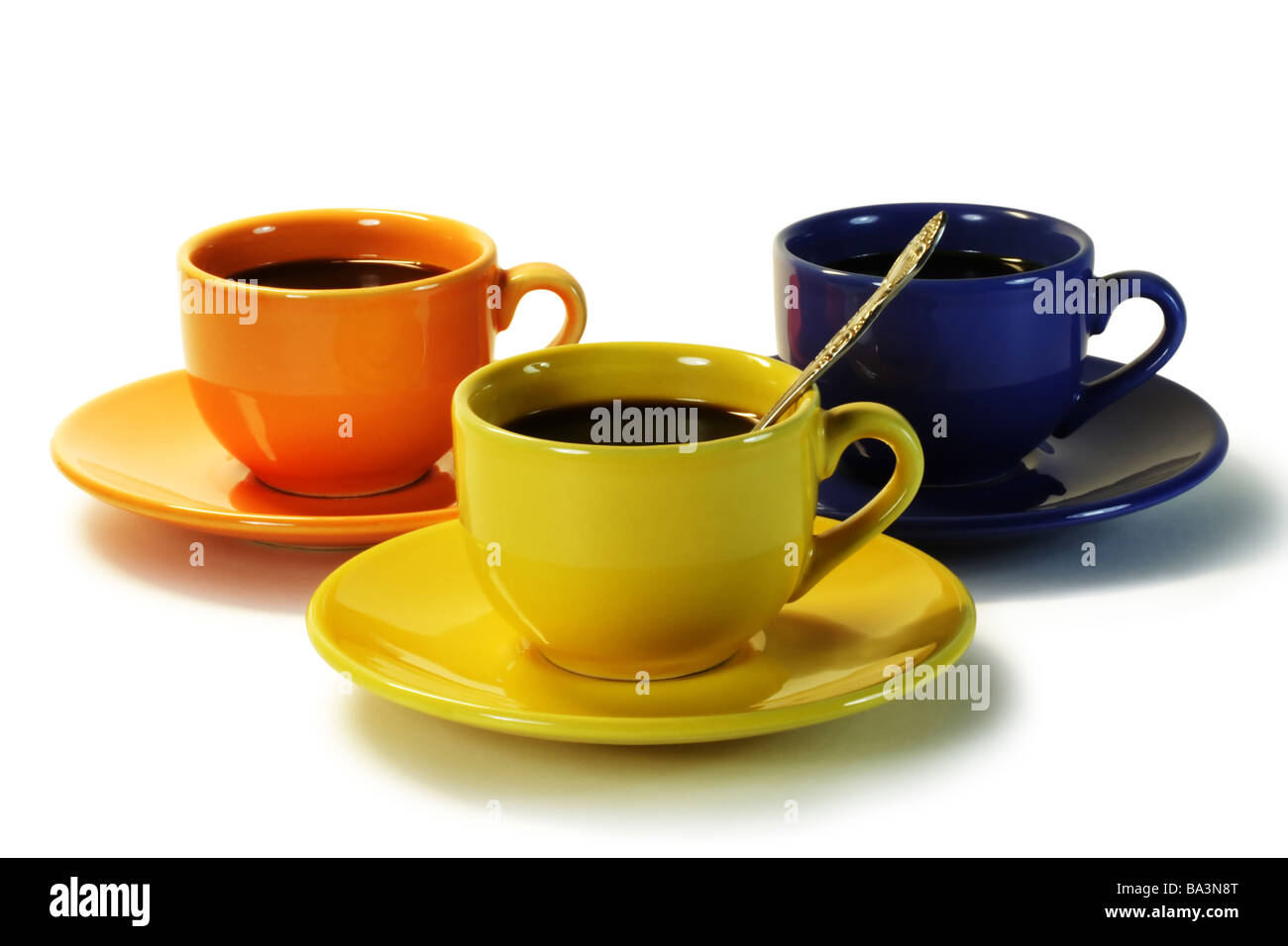 Three color coffee cups isolated on white with maximum DOF clipping ...