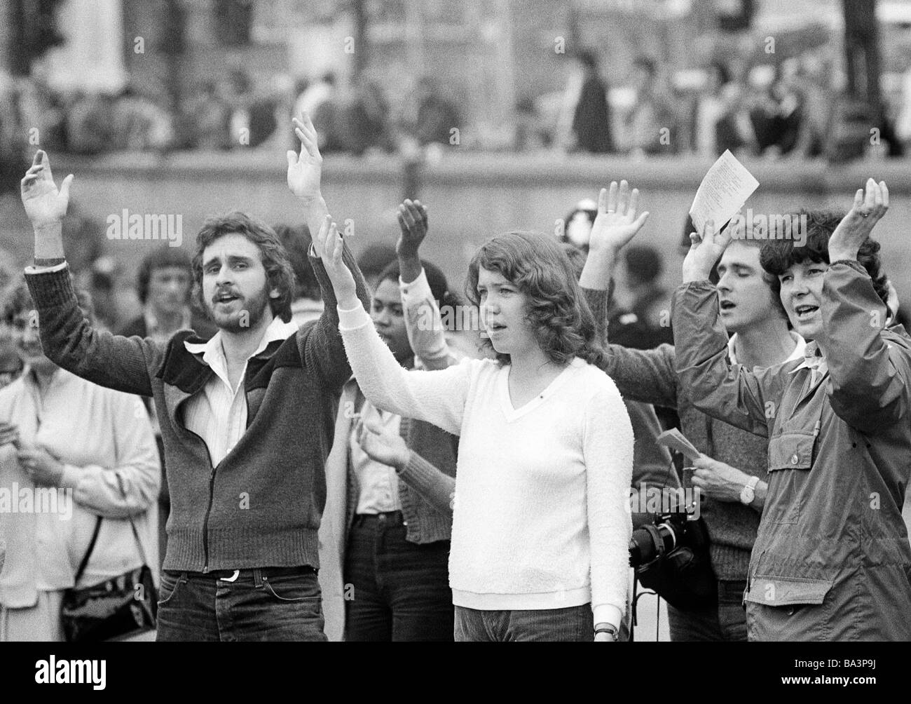 Seventies, black and white photo, people on a peace demonstration, men ...