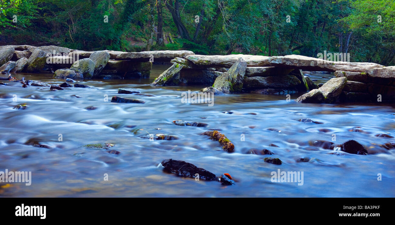 The ancient clapper bridge Tarr Steps crossing the River Barle in ...