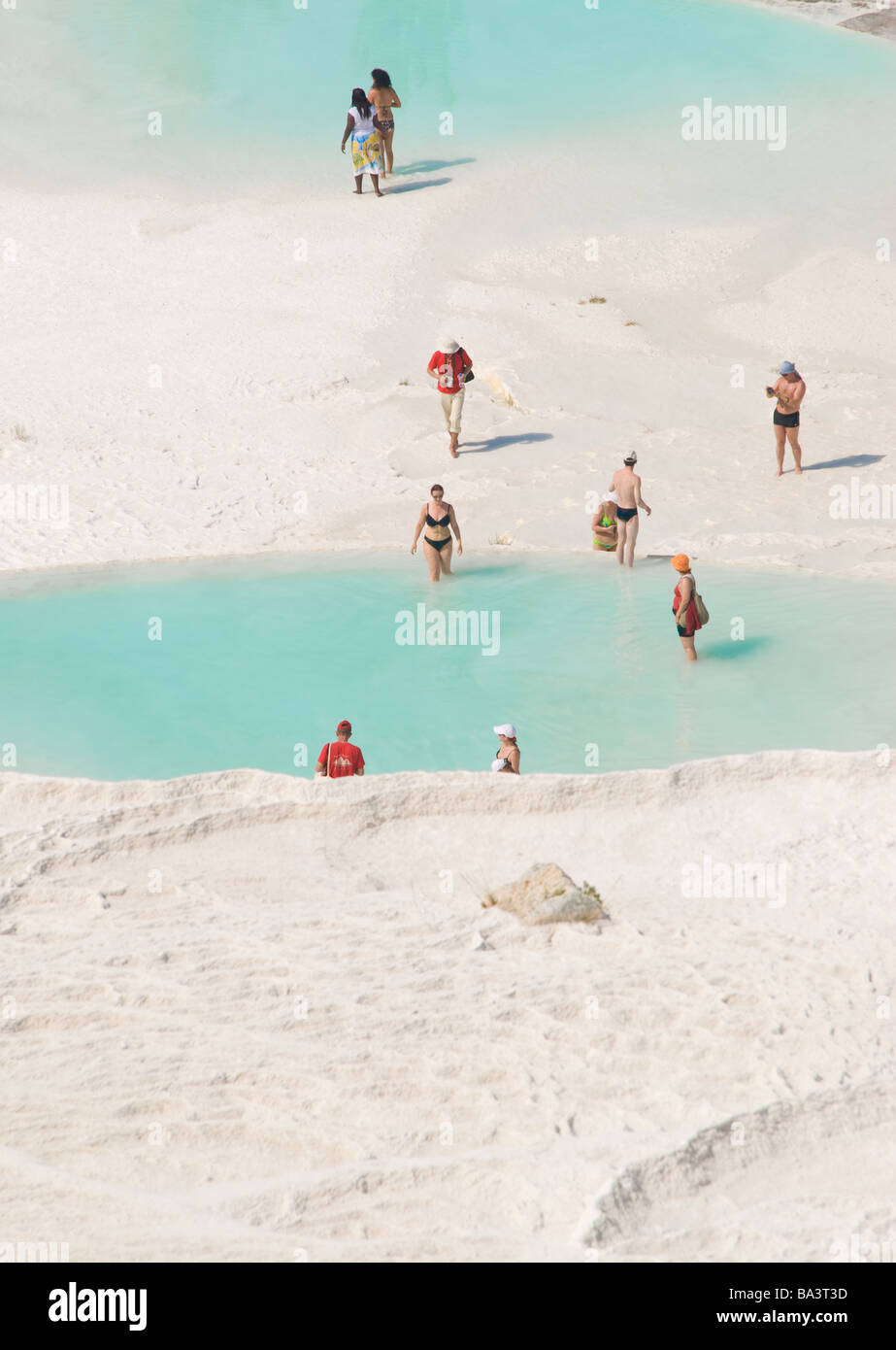 Pamukkale tourists sunbathing by the thermal springs Turkey Stock Photo ...