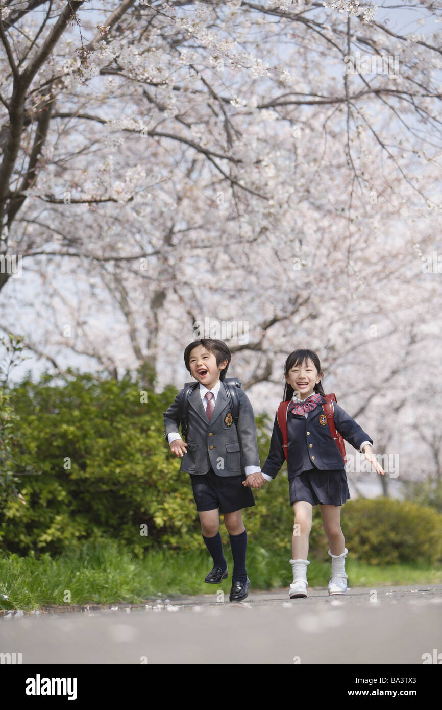 Schoolmate going to school Stock Photo - Alamy