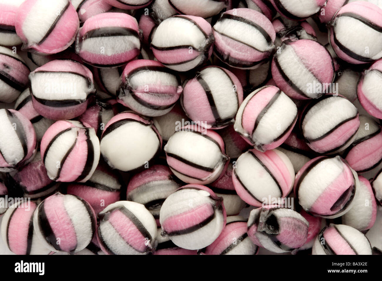 Three toned candies full frame Stock Photo - Alamy