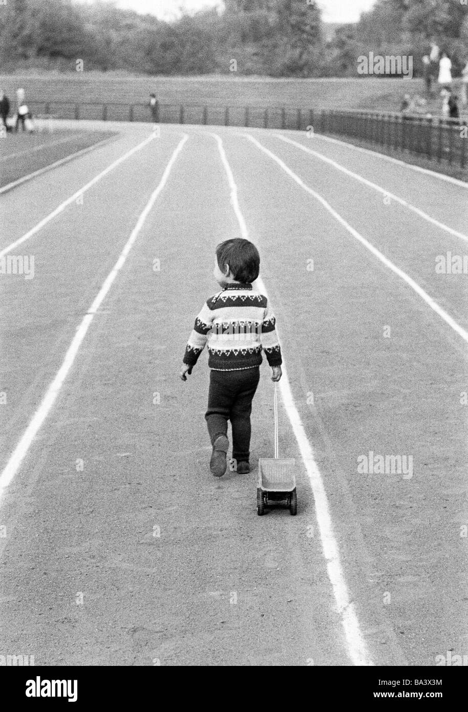 Black And White Boy And Toy Car Stock Photos & Black And White Boy And ...