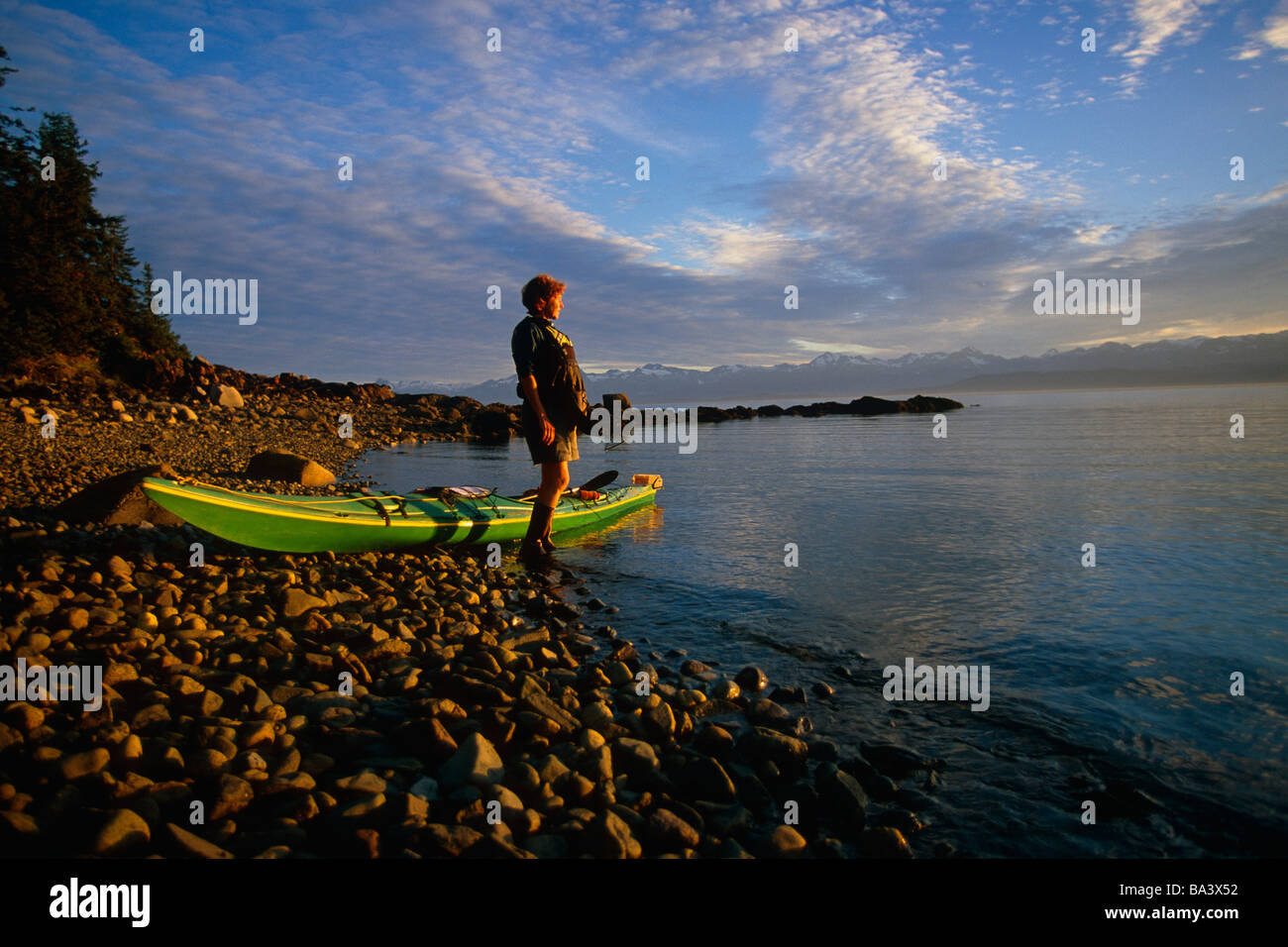 Woman kayaker viewing scenery @ Berners Bay Inside Passage Southeast ...
