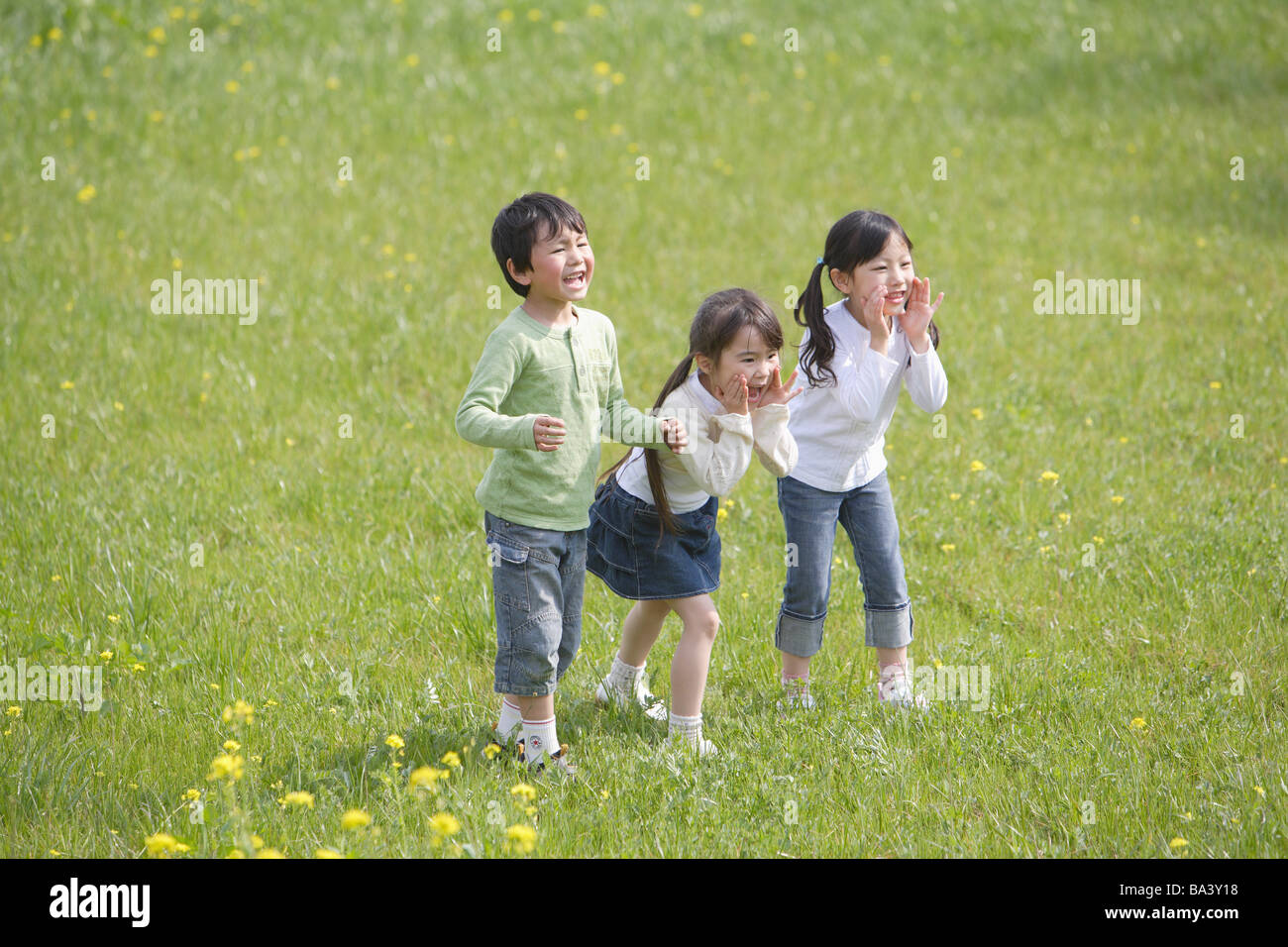 Children shouting in the park Stock Photo - Alamy