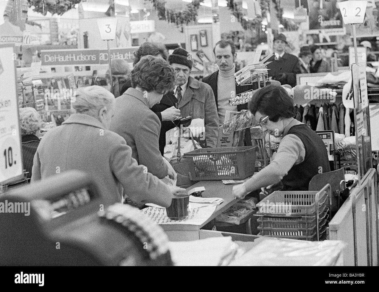 Seventies, black and white photo, economy, cashier and customers at a ...