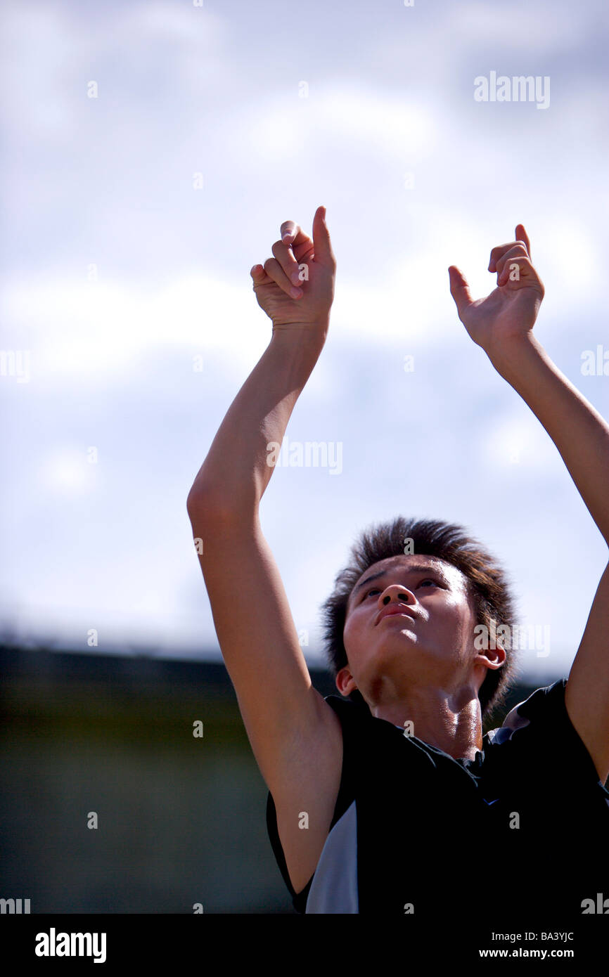 Teenage boy throwing a basketball Stock Photo - Alamy
