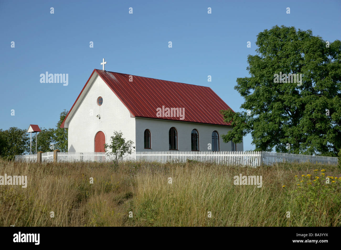 Small church with red roof and cemetery hi-res stock photography and ...