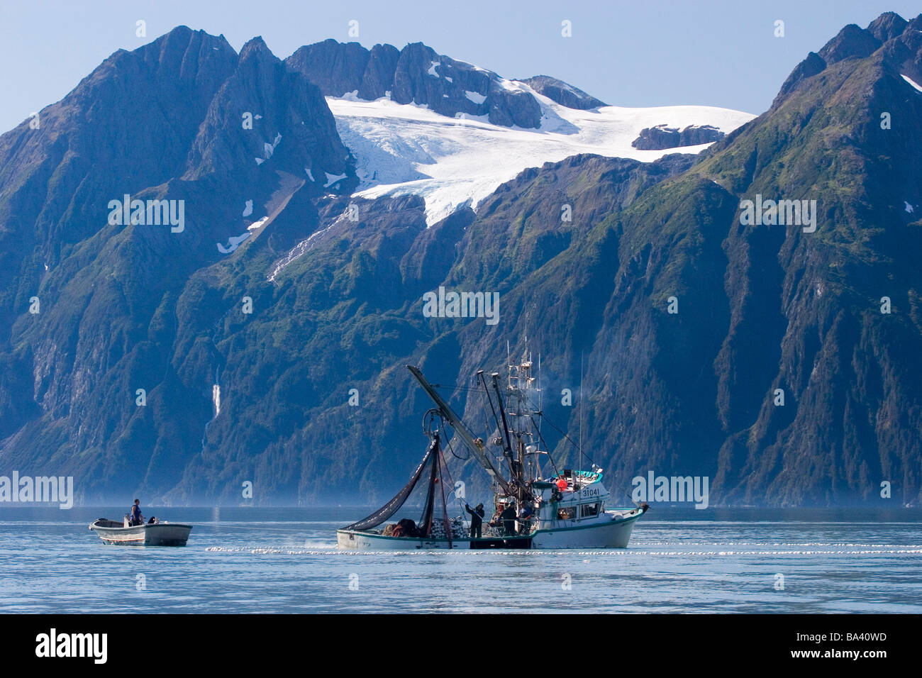 Commercial fishing boat *Malamute Kid* seining for silver salmon Port ...