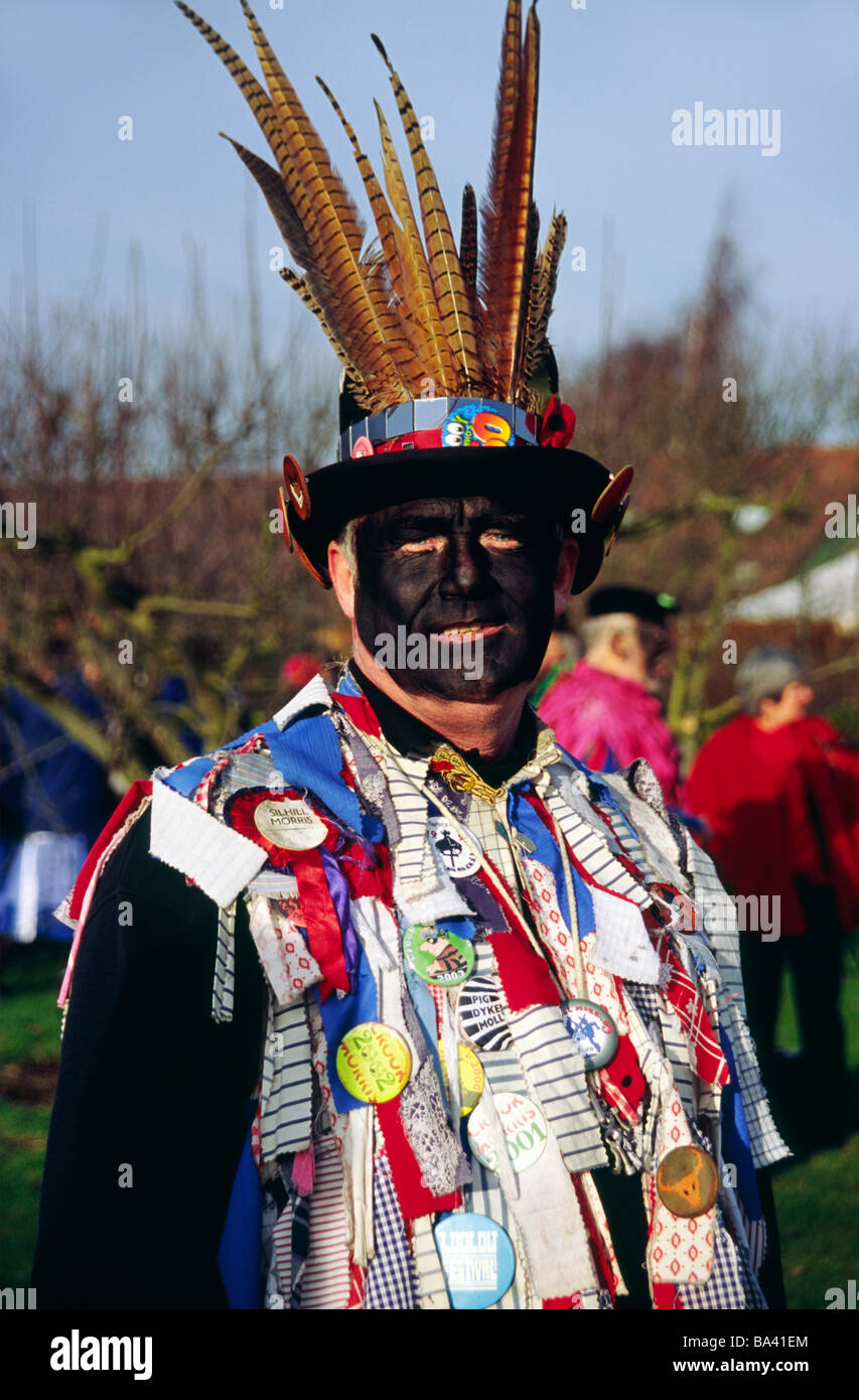 Morris Dancer wearing feathered hat with blacked up face Stock Photo ...