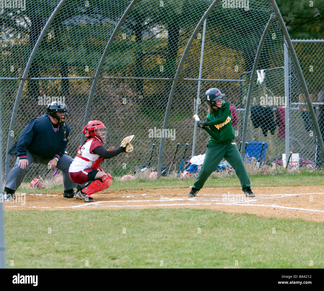 A batter, catcher and umpire at a girls highschool softball game Stock ...