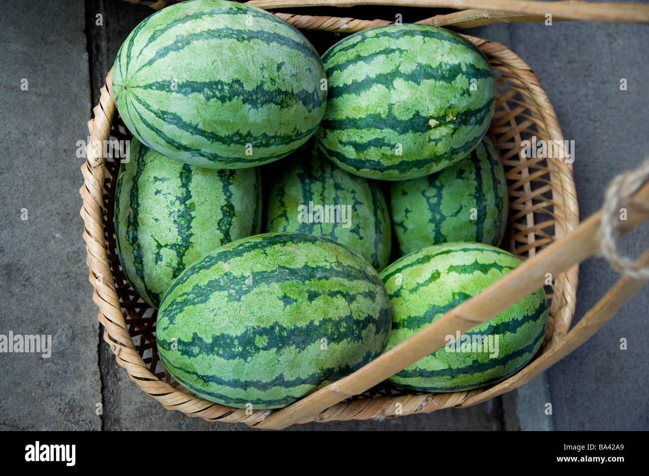 Basket with watermelons Stock Photo - Alamy