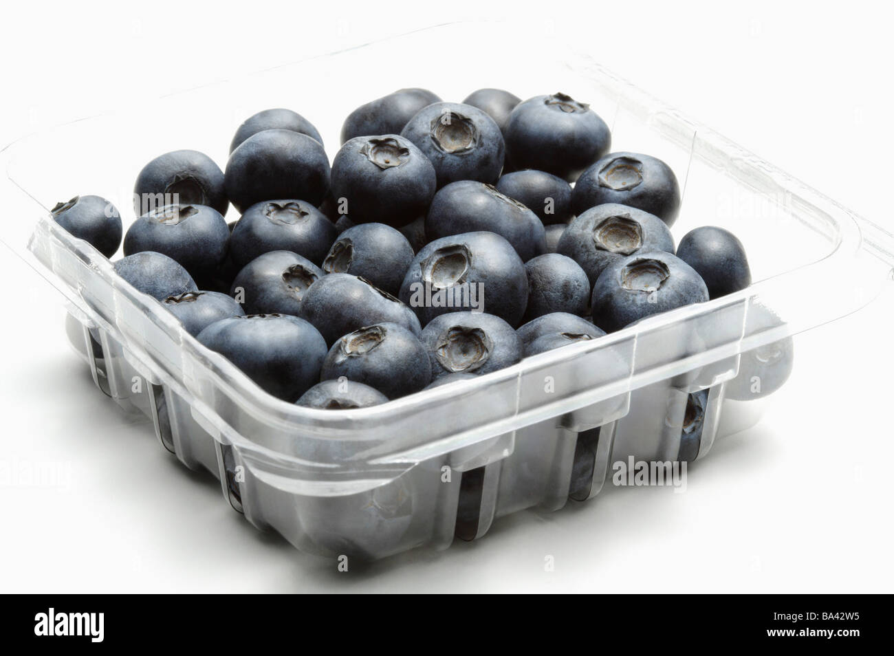 Fruit carton filled with blueberries Stock Photo - Alamy