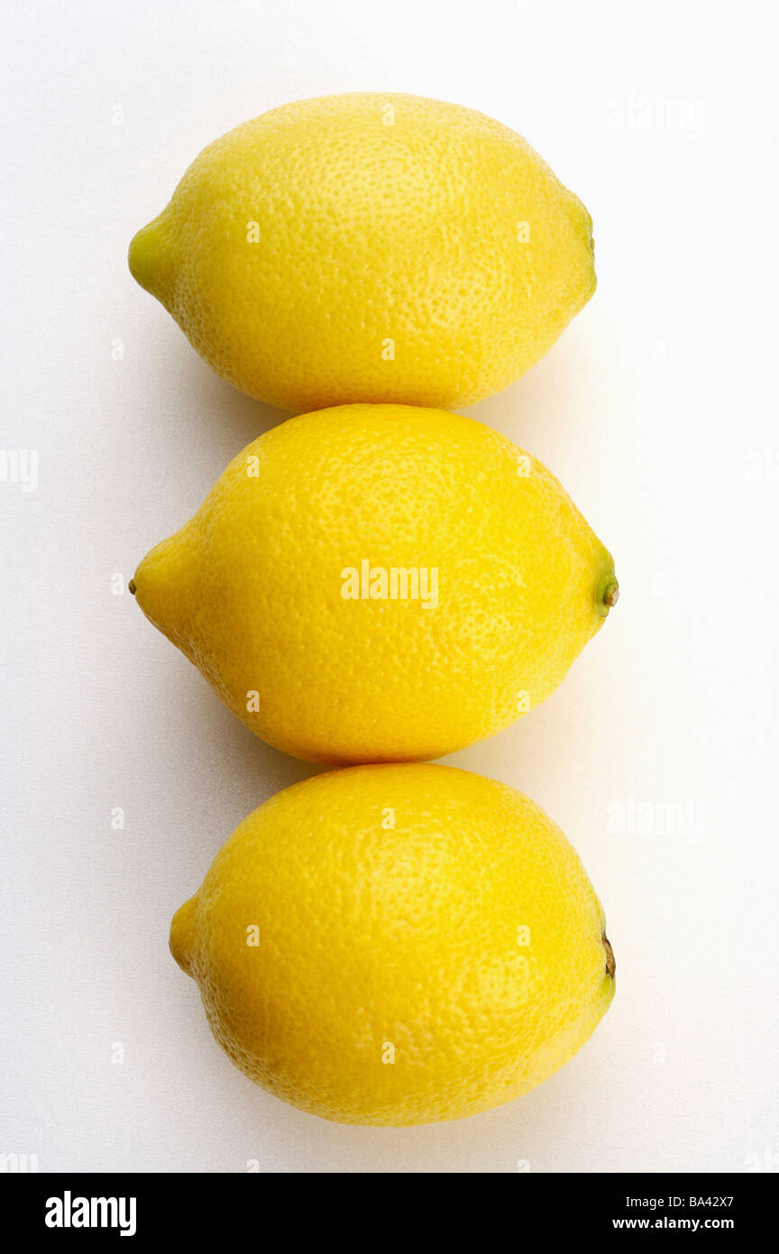 Lemons in a row Stock Photo - Alamy