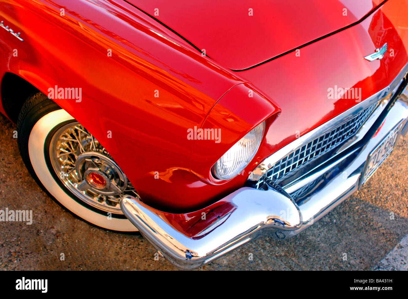 Gleaming red1957 Ford thunderbird convertible, parked on the street in ...