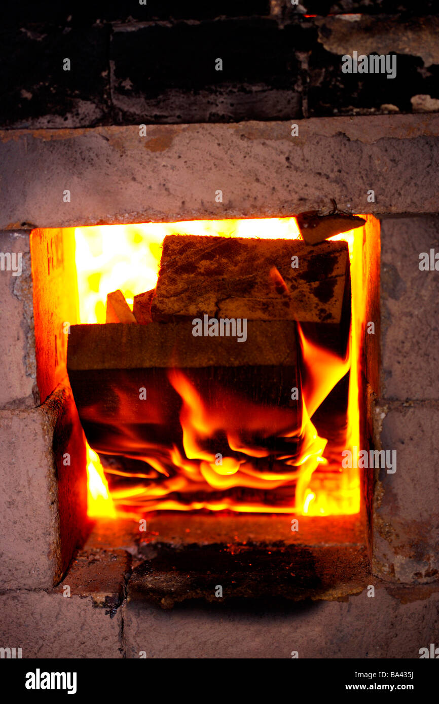 Close up of logs in ceramic kiln s entrance firing Stock Photo - Alamy