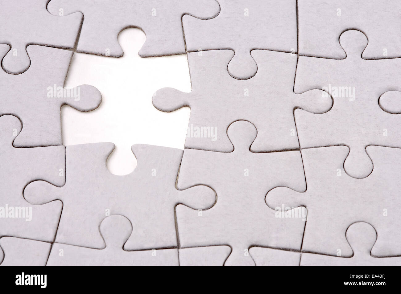Missing piece of jigsaw puzzle Stock Photo - Alamy