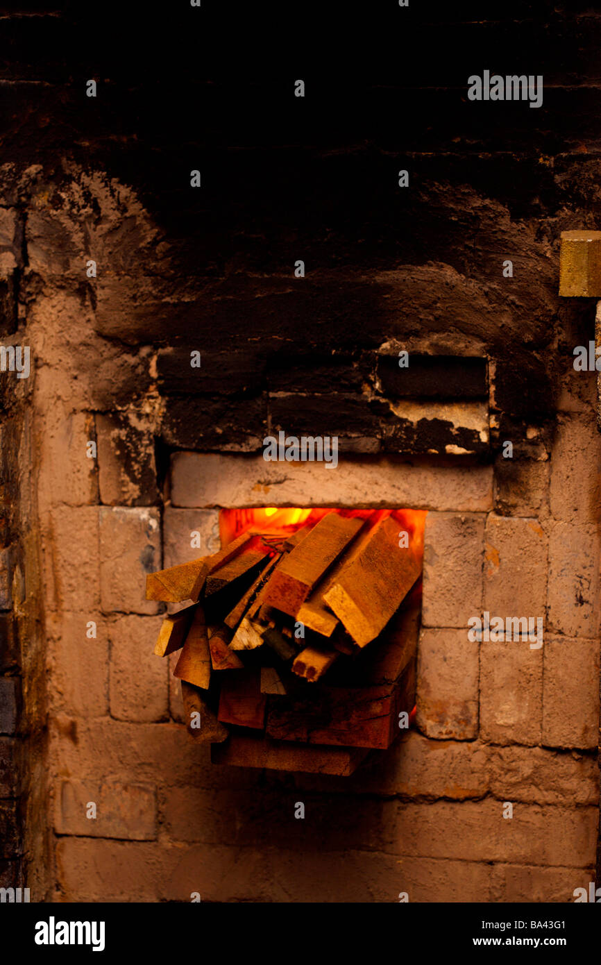 Close up of logs in ceramic kiln s entrance firing Stock Photo - Alamy