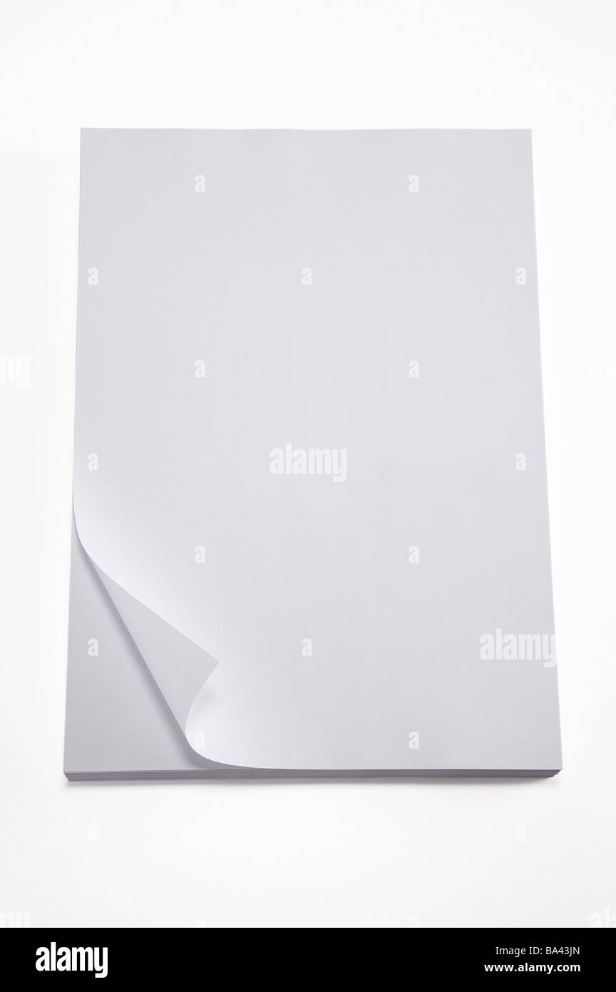 Papers page folded back Stock Photo - Alamy