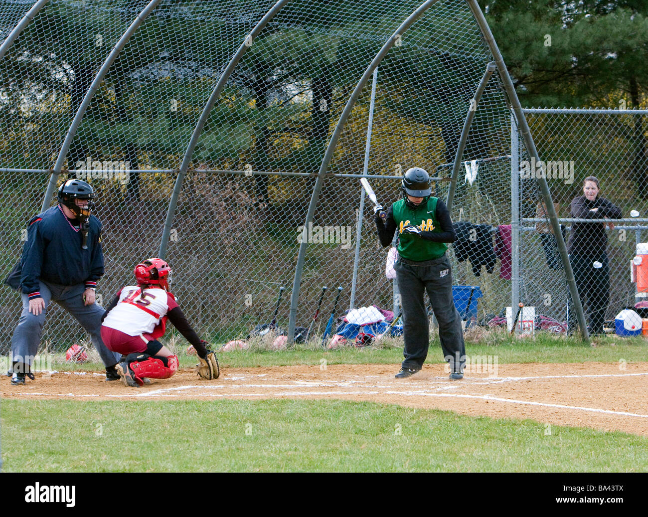 A batter, catcher and umpire at a girls highschool softball game Stock ...