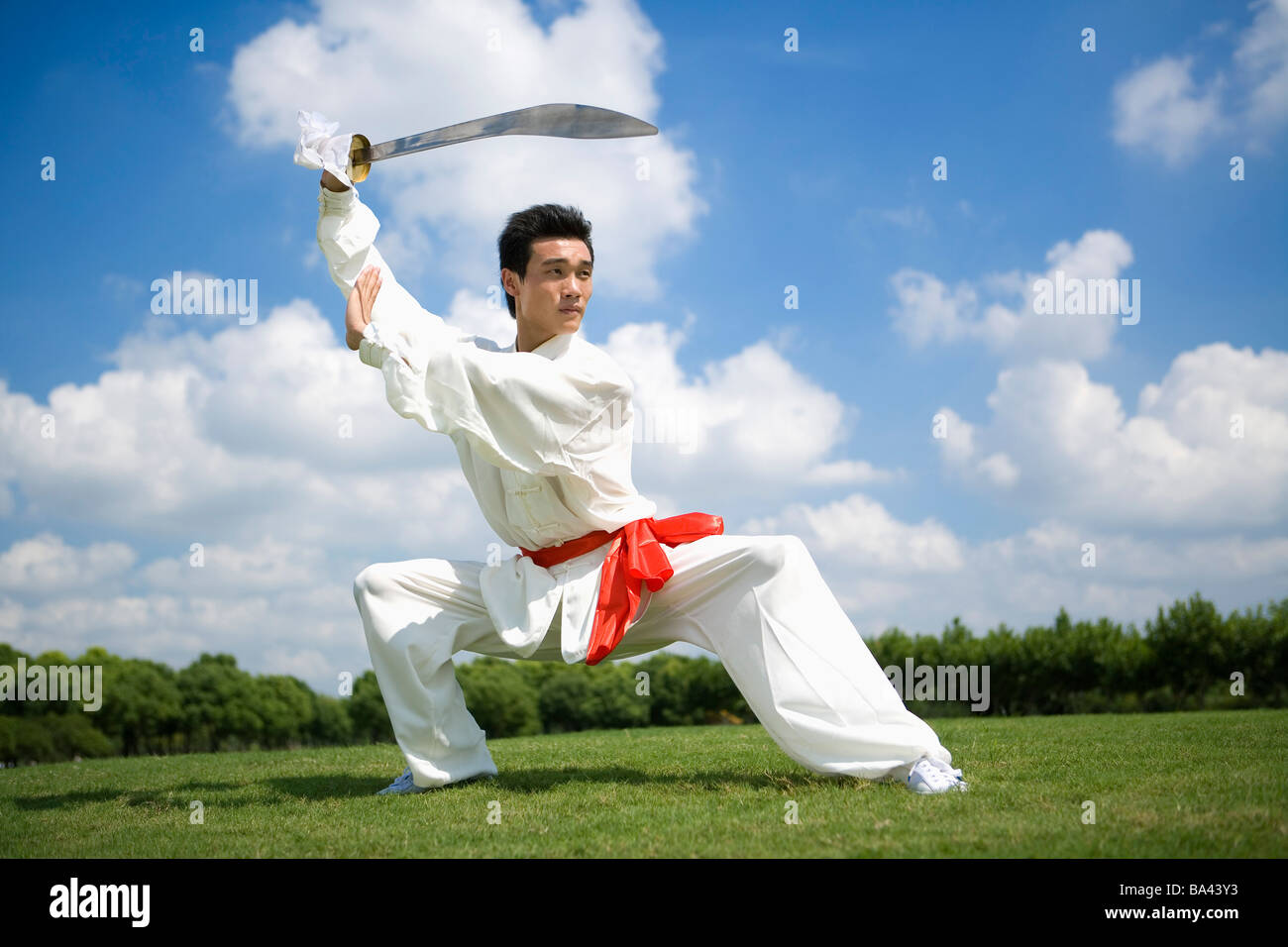 China man practicing martial arts with swords Stock Photo - Alamy