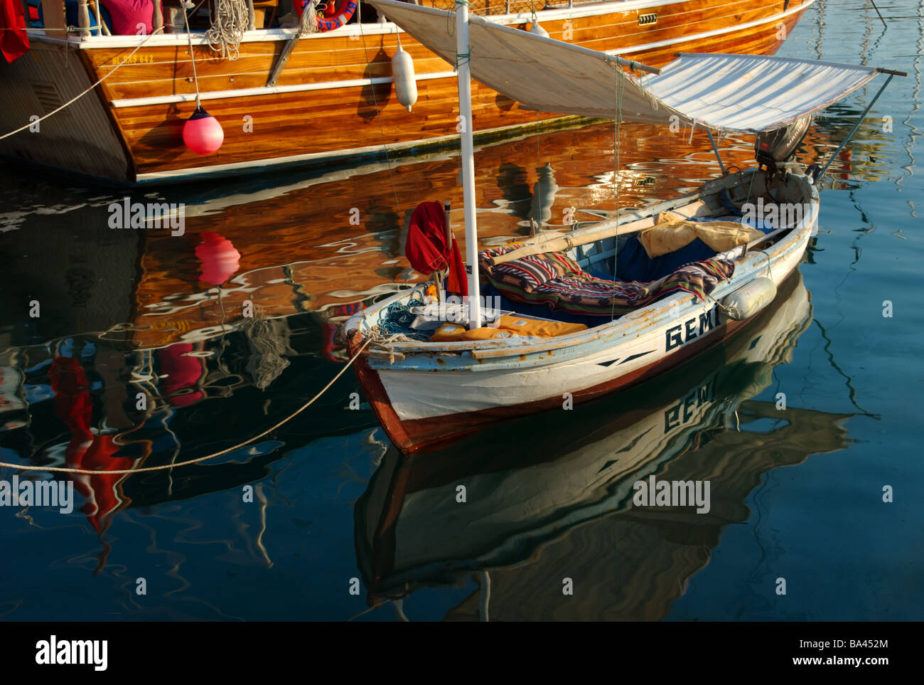 A native fishing boat moored in the harbor at Kalkan Turkey Stock Photo ...