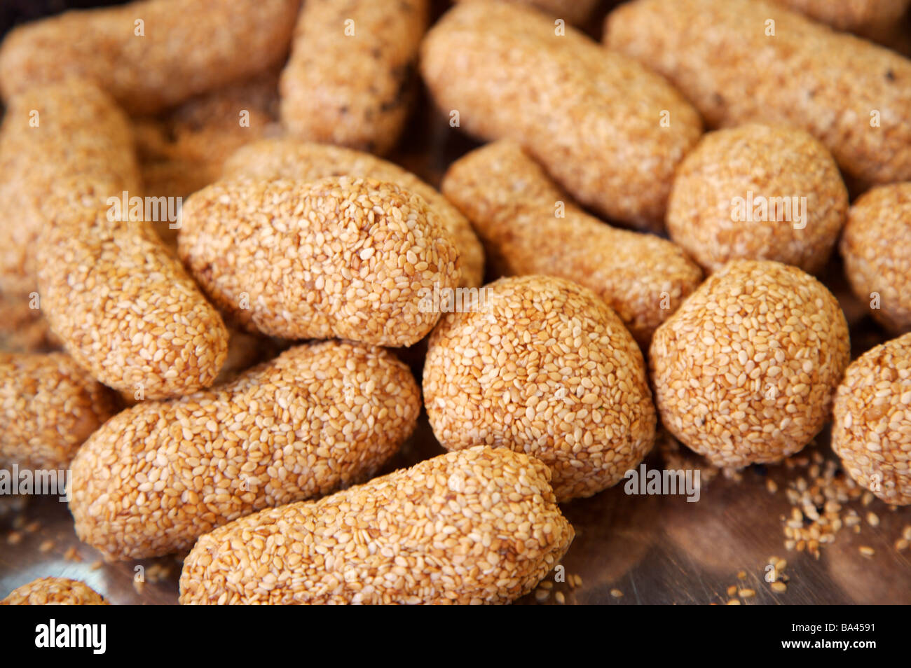 Glutinous food stained fully with sesame Stock Photo - Alamy