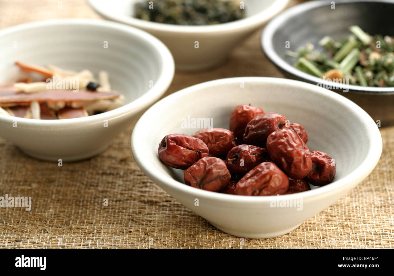 Four dishes of Chinese dried herb close up Stock Photo - Alamy