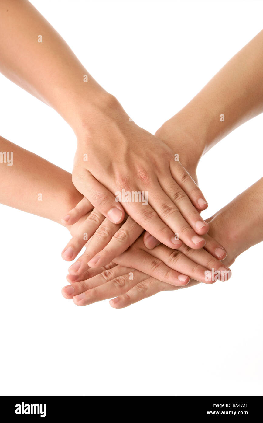 Hands in pile Stock Photo - Alamy