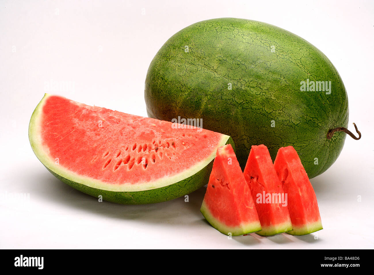 Whole and sliced watermelon Stock Photo - Alamy