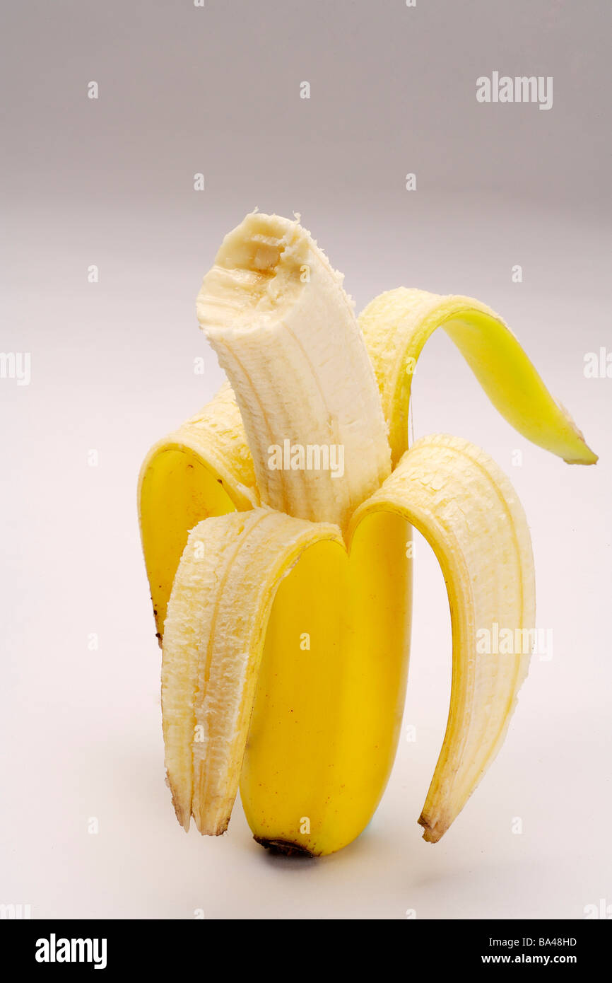 Bite taken from banana Stock Photo - Alamy