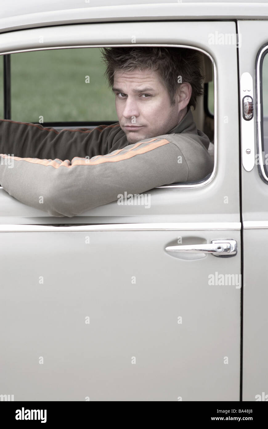 Man 30-40 years head portrait detail side-windows door driver-door ...