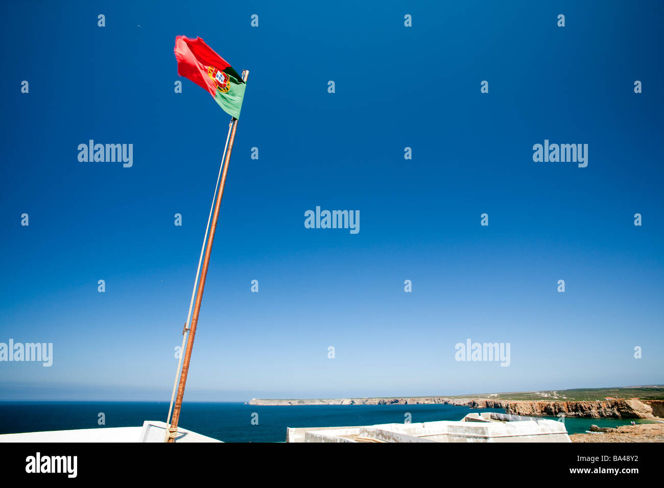 The Portuguese flag at the fortress of Sagres municipality of Vila do ...