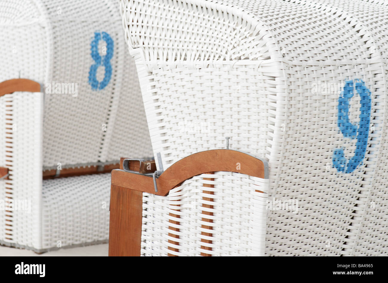 Sand wicker beach chairs numbers eight nine white blue woven ...